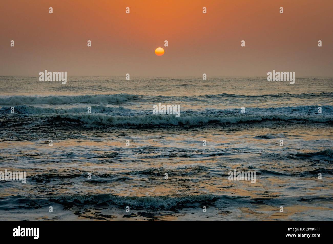 Atlantic Ocean waves at sunset at Terrace Bay in the Skeleton Coast ...