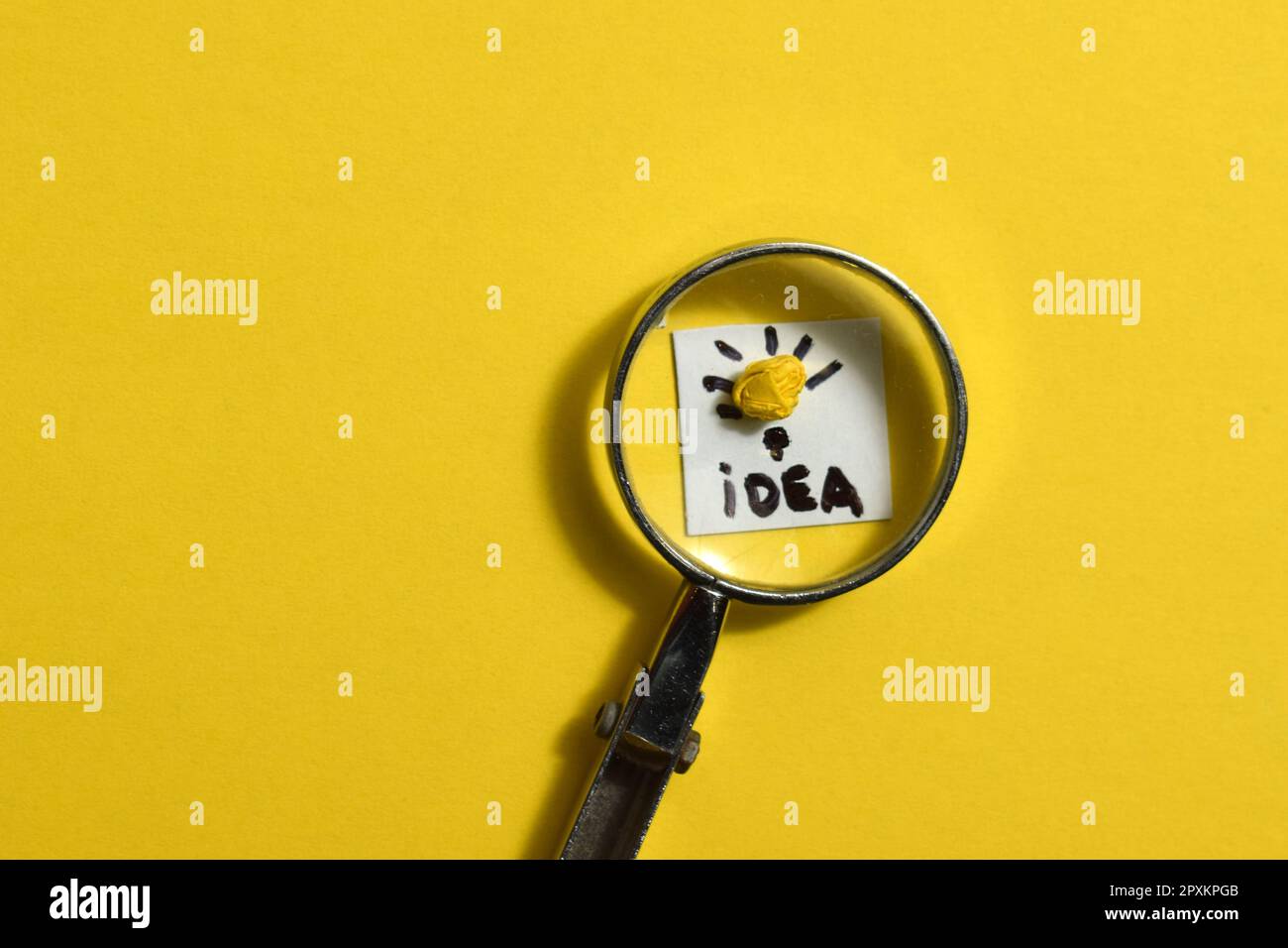 Creative idea concept, magnifying glass and light bulb icon Stock Photo ...