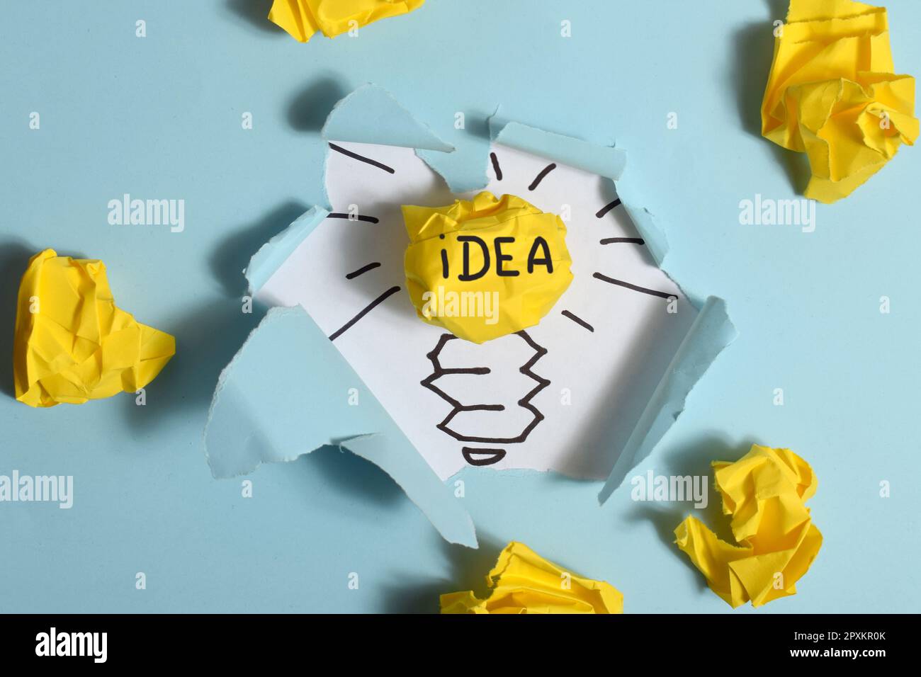 Creative thinking ideas and innovation concept. Paper scrap ball yellow ...