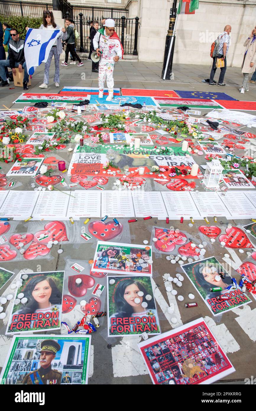 Posters and messages in support of freedom and monarchism for Iran are ...