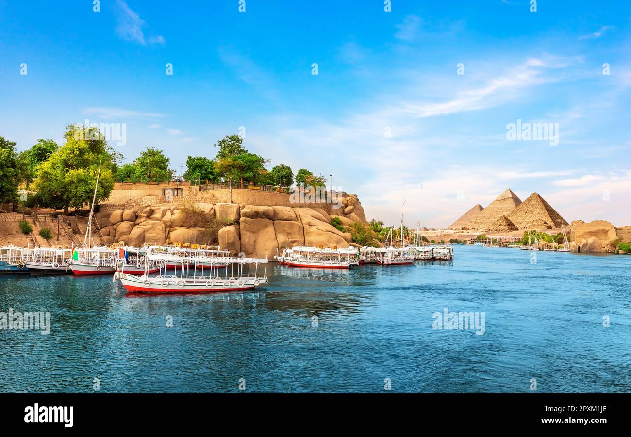 Traditional colorful egyptian boats in the Nile on the way to the ...