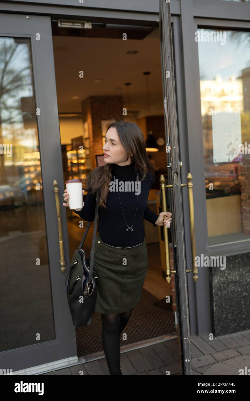 Exiting building hi-res stock photography and images - Alamy