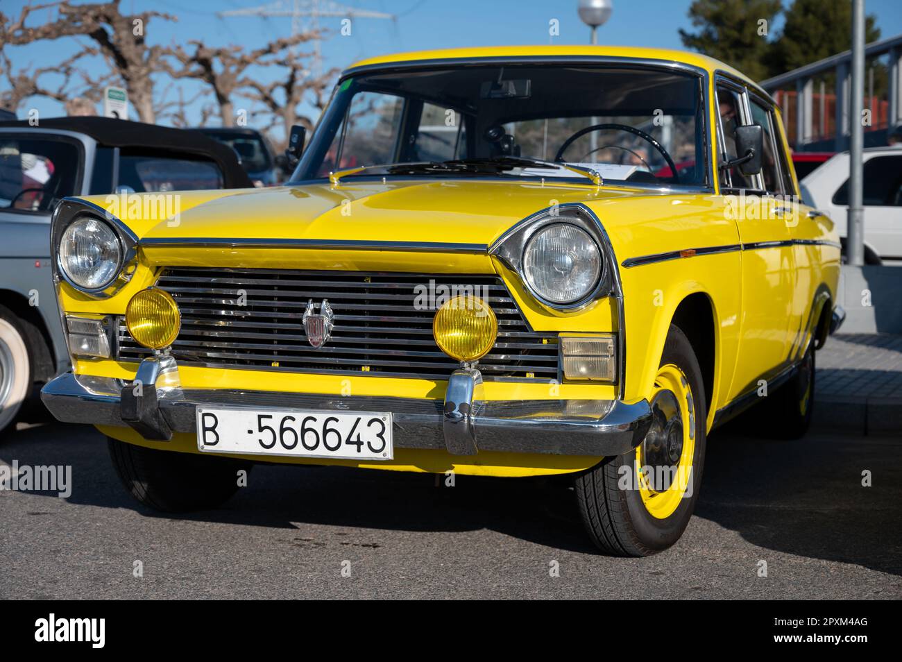 Detail of a classic Spanish car, the yellow Seat 1500, is rare Stock ...