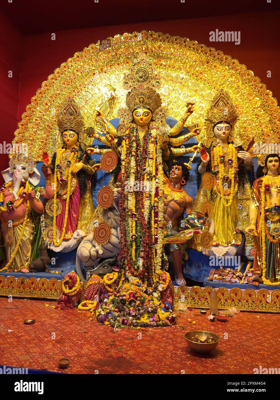 The golden statue of the Hindu mother goddess Durga. Durga Puja in ...
