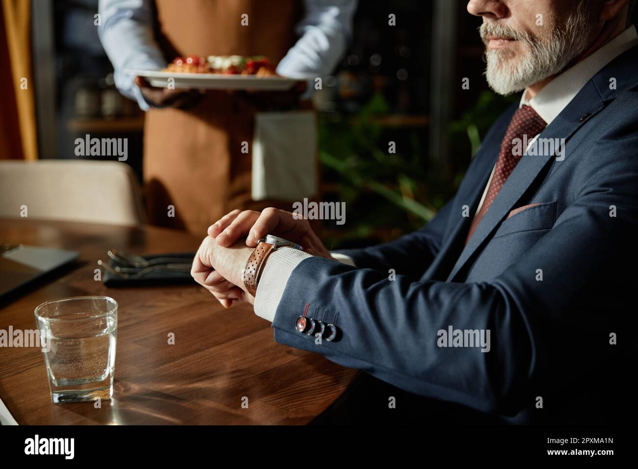 African waiter serve coffee hi-res stock photography and images - Alamy