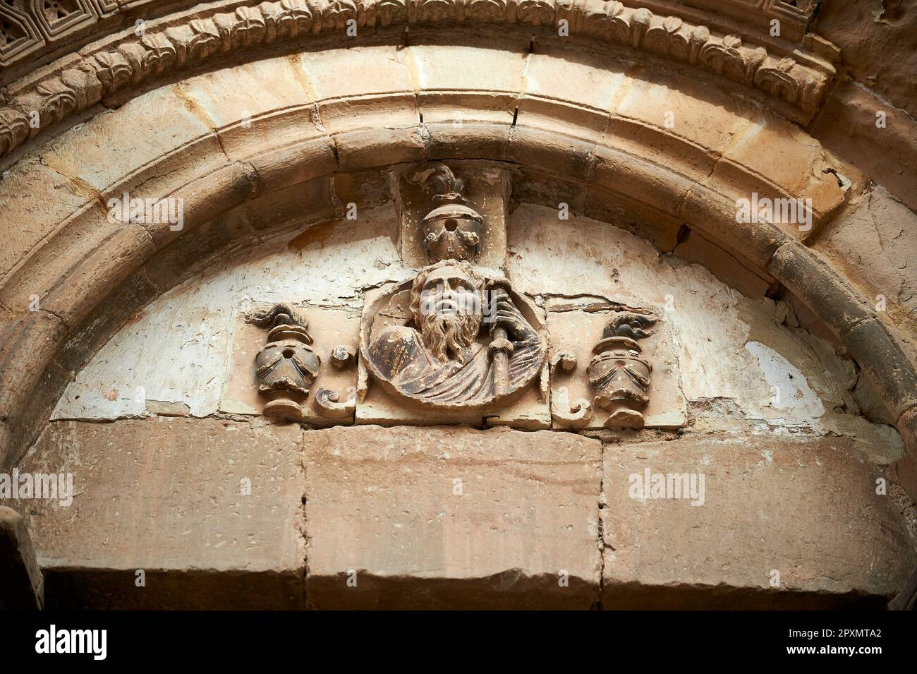 Stone sculpture of the apostle Santiago in the tympanum of the door of ...