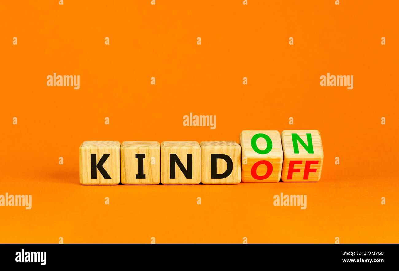 Kind on or off symbol. Businessman turns wooden cubes and changes word ...