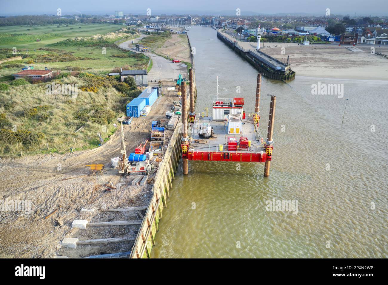 Mobile working rig positioned for repair works to the damaged sea wall ...