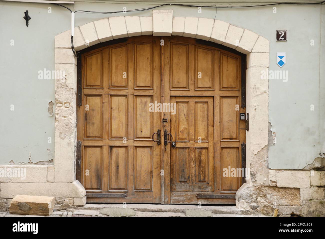 Old ancient wooden door texture in european medieval style. The ...
