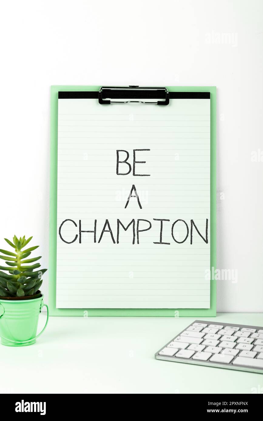 Text caption presenting Be A Champion, Word Written on Triumph in a ...