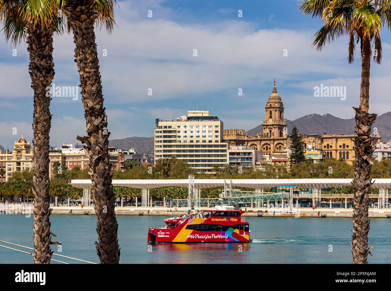 Tourist sightseeing boat in the Port of Malaga on the Costa del Sol in ...