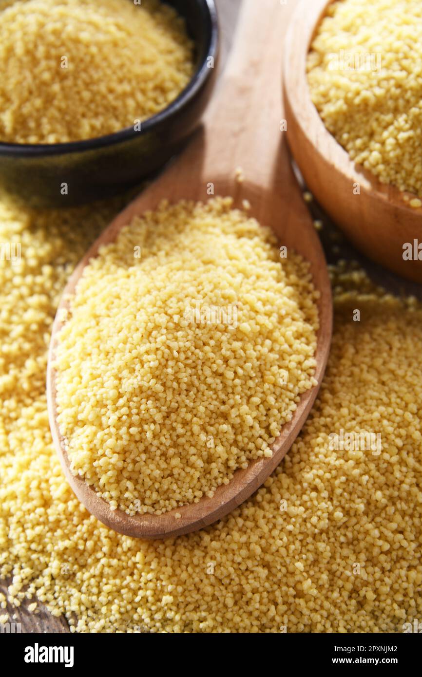 Composition with uncooked couscous Stock Photo - Alamy