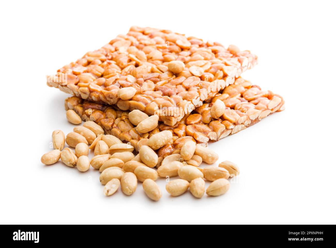 Sweet peanut brittle. Tasty peanuts in caramel isolated on the white ...