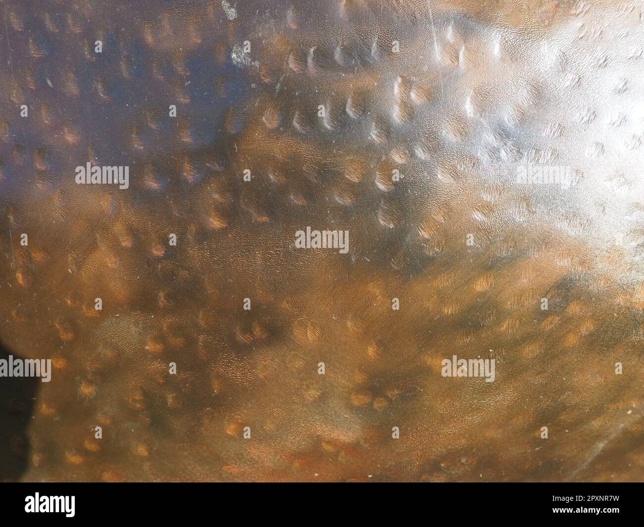 Metal bronze textured plate. Bronze or copper polished surface with ...