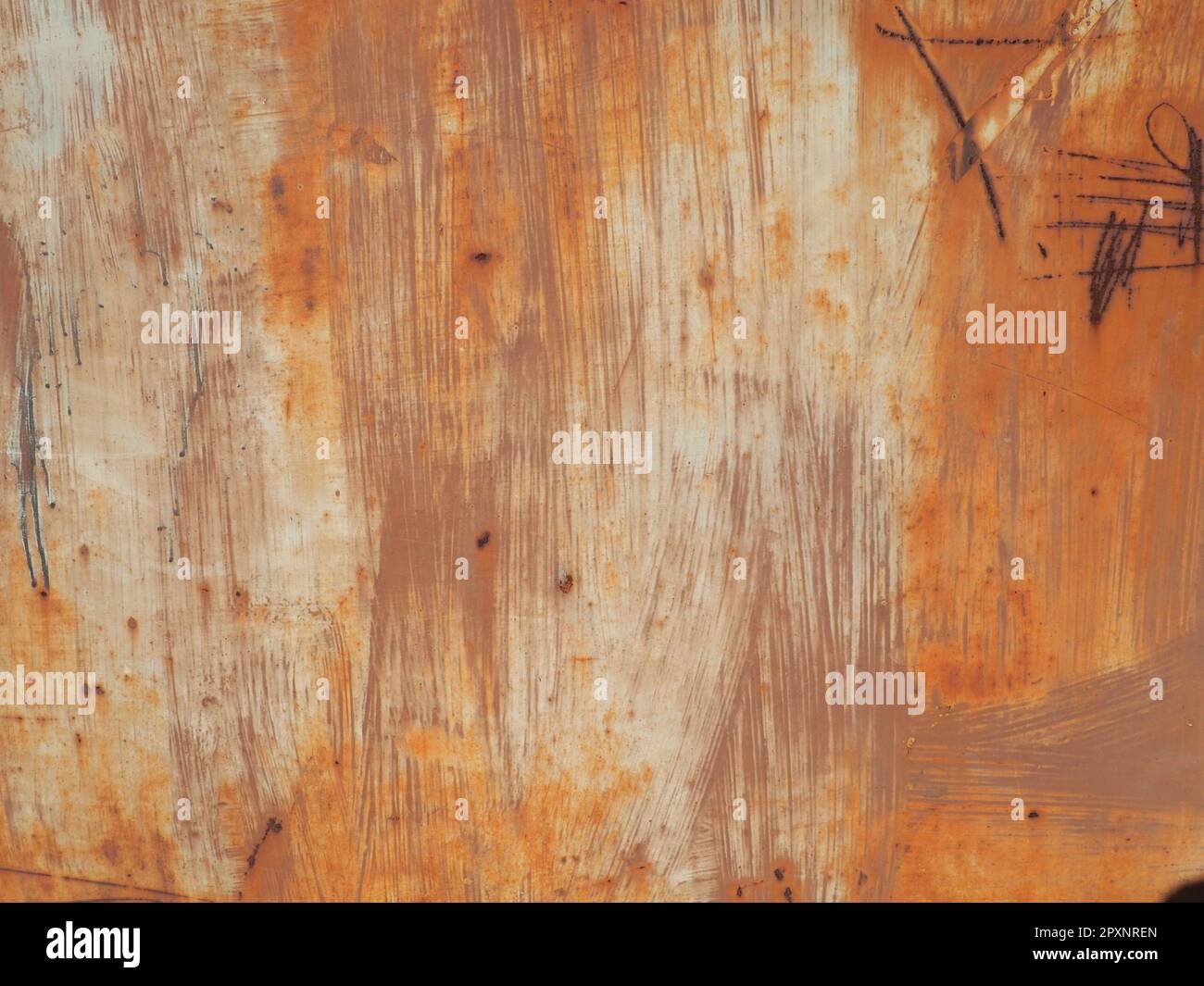 rusty scratched metal. The metal surface has long been painted yellow ...
