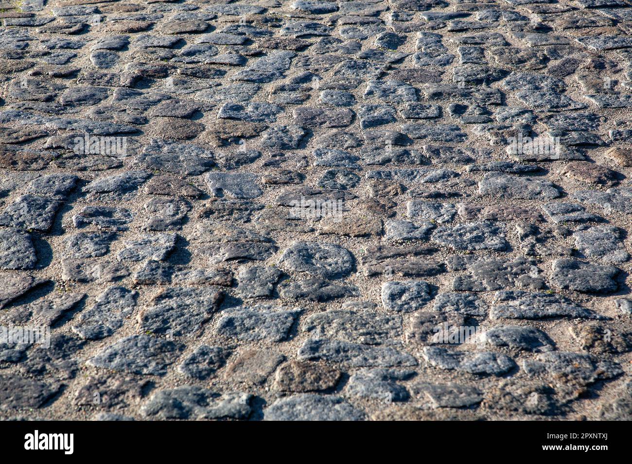 Traditional old cobblestone pathway background Stock Photo - Alamy