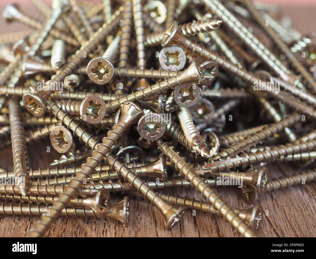 wood screws on melamine manufactured wood panel Stock Photo - Alamy