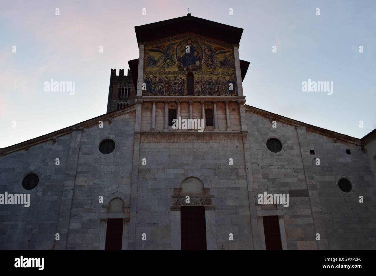 This image displays an exterior view of a historical church and its ...