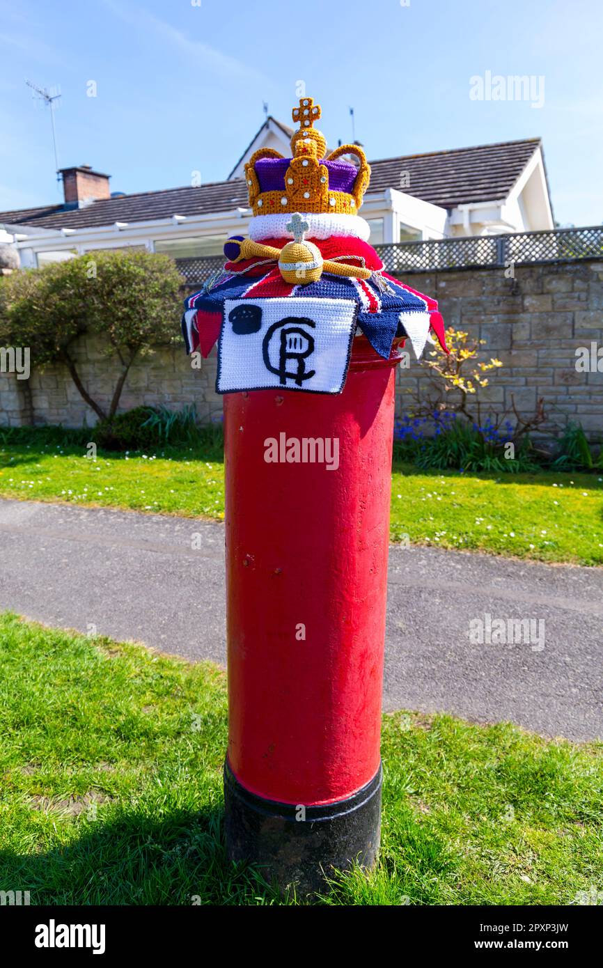 Poole, Dorset, UK. 2nd May 2023. A knitted crocheted postbox topper for ...