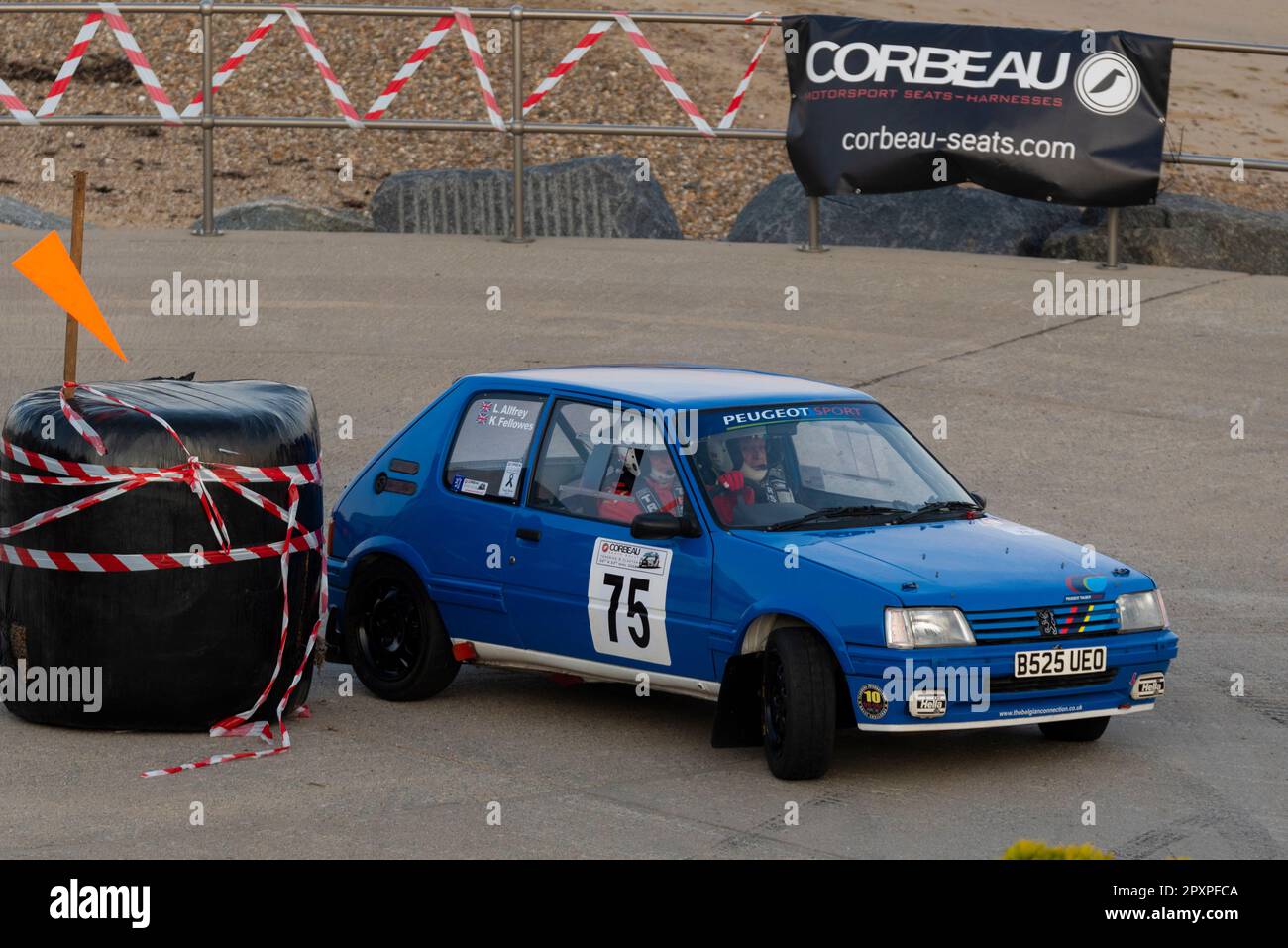 Les Allfrey racing a 1985 Peugeot 205 GTI competing in the Corbeau ...