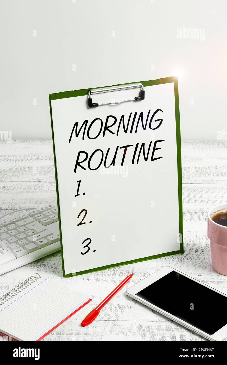 Hand writing sign Morning Routine, Word for initiation of consumer ...
