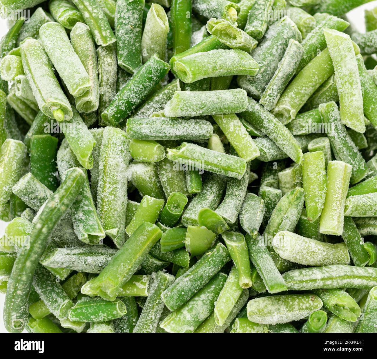 Frozen cut green string beans close up as background. Organic healthy ...