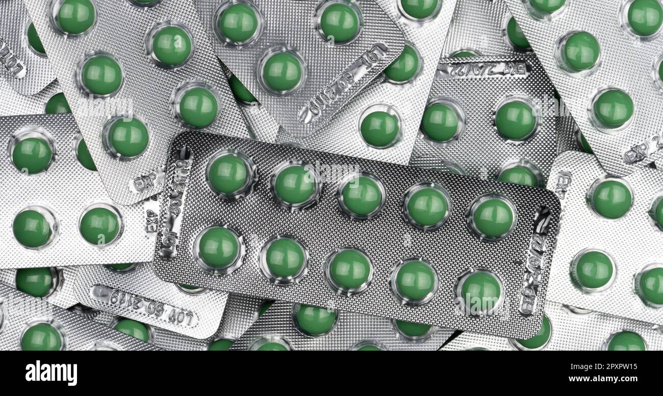 Full frame green round pills in blister pack. Prescription medicine ...