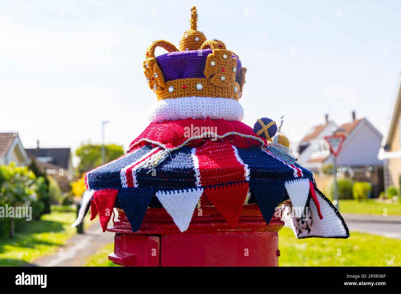 Poole, Dorset, UK. 2nd May 2023. A knitted crocheted postbox topper for ...