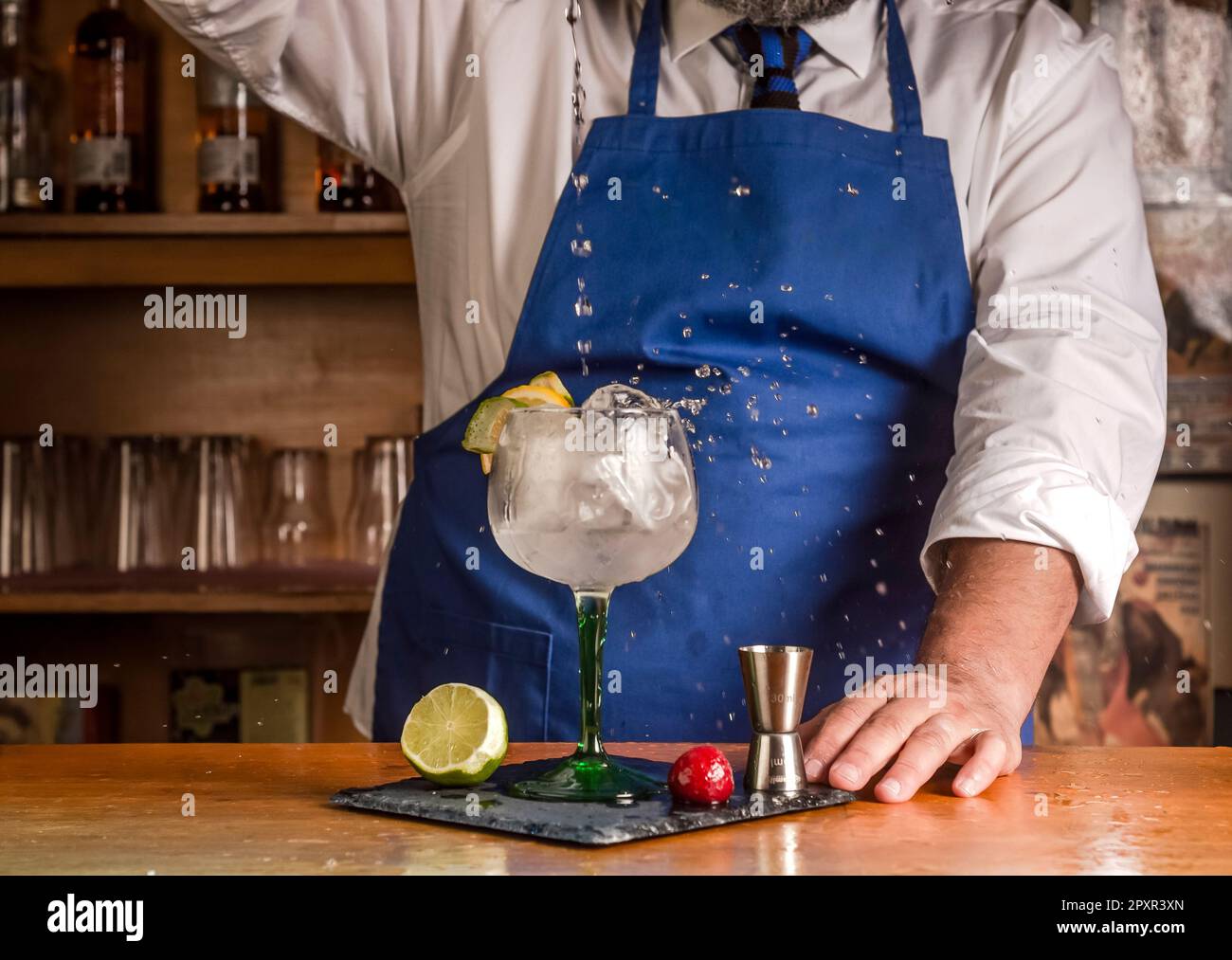 Waiter making cocktail hi-res stock photography and images - Alamy