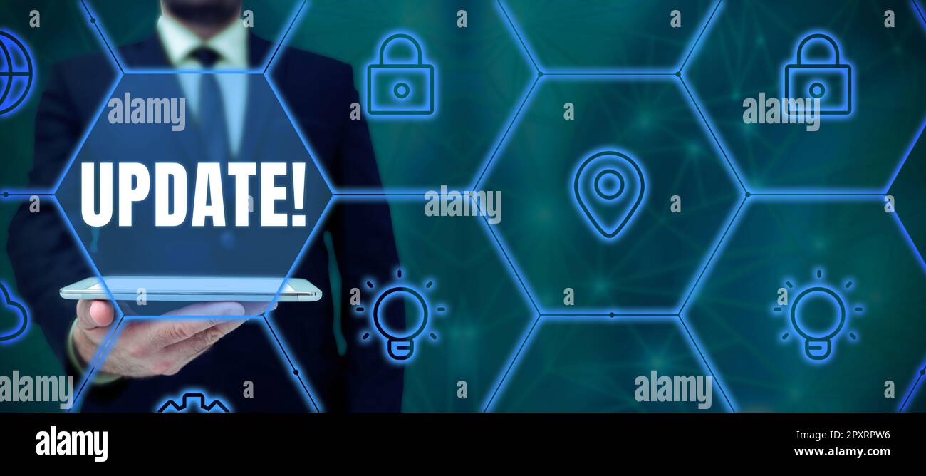 Hand writing sign Update, Word for Up to date Make something more ...