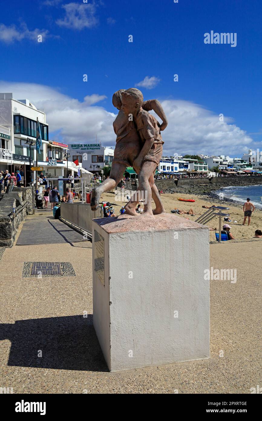 Statue of two boys wrestling, Playa Blanca, Lanzarote, Canary Islands ...