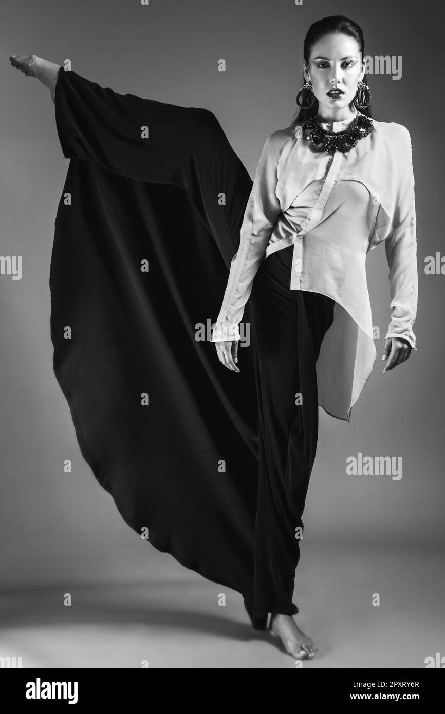 Beautiful fashionable girls in a stylish dress, showing different poses ...