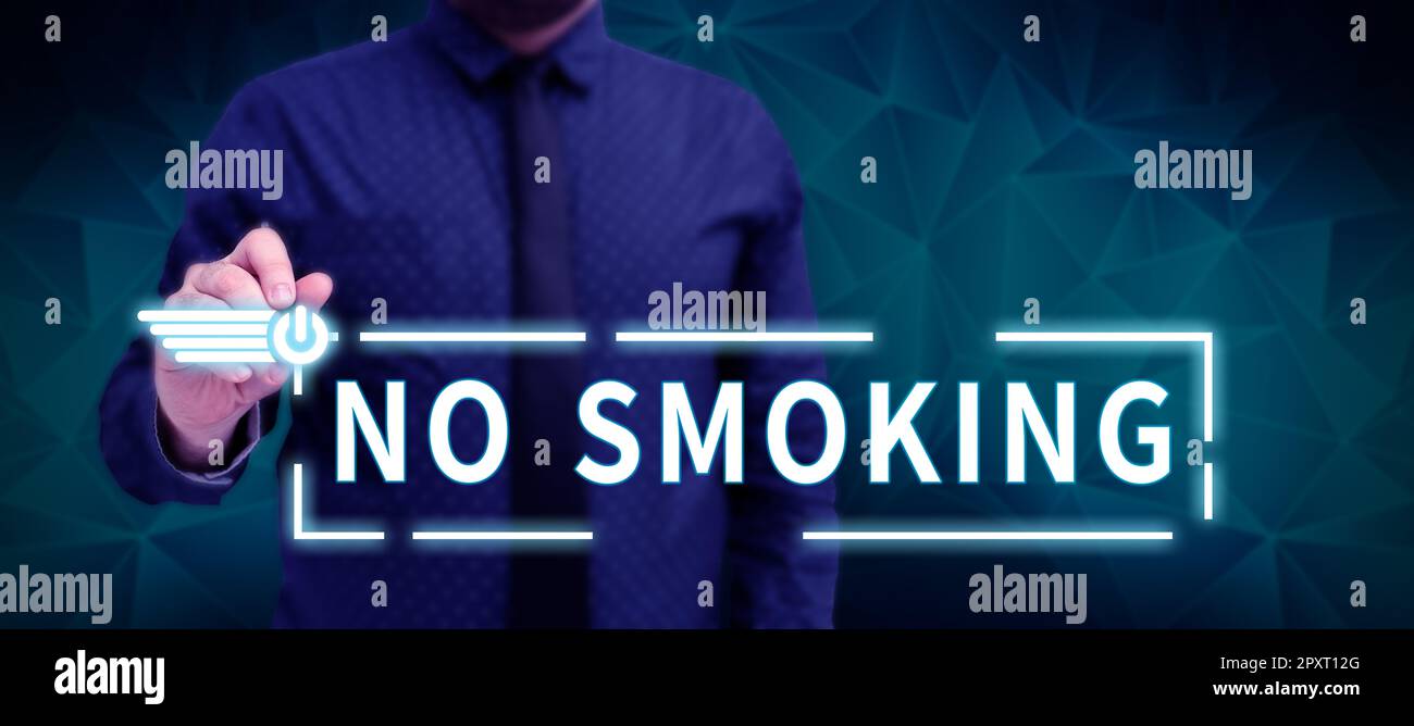 Hand writing sign No Smoking, Word for using tobacco is forbiden in ...