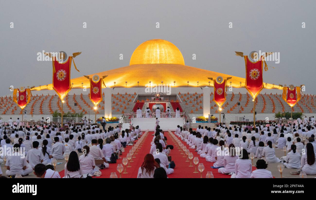 Devotees pray during Makha Bucha Day ceremonies at Wat Phra Dhammakaya ...
