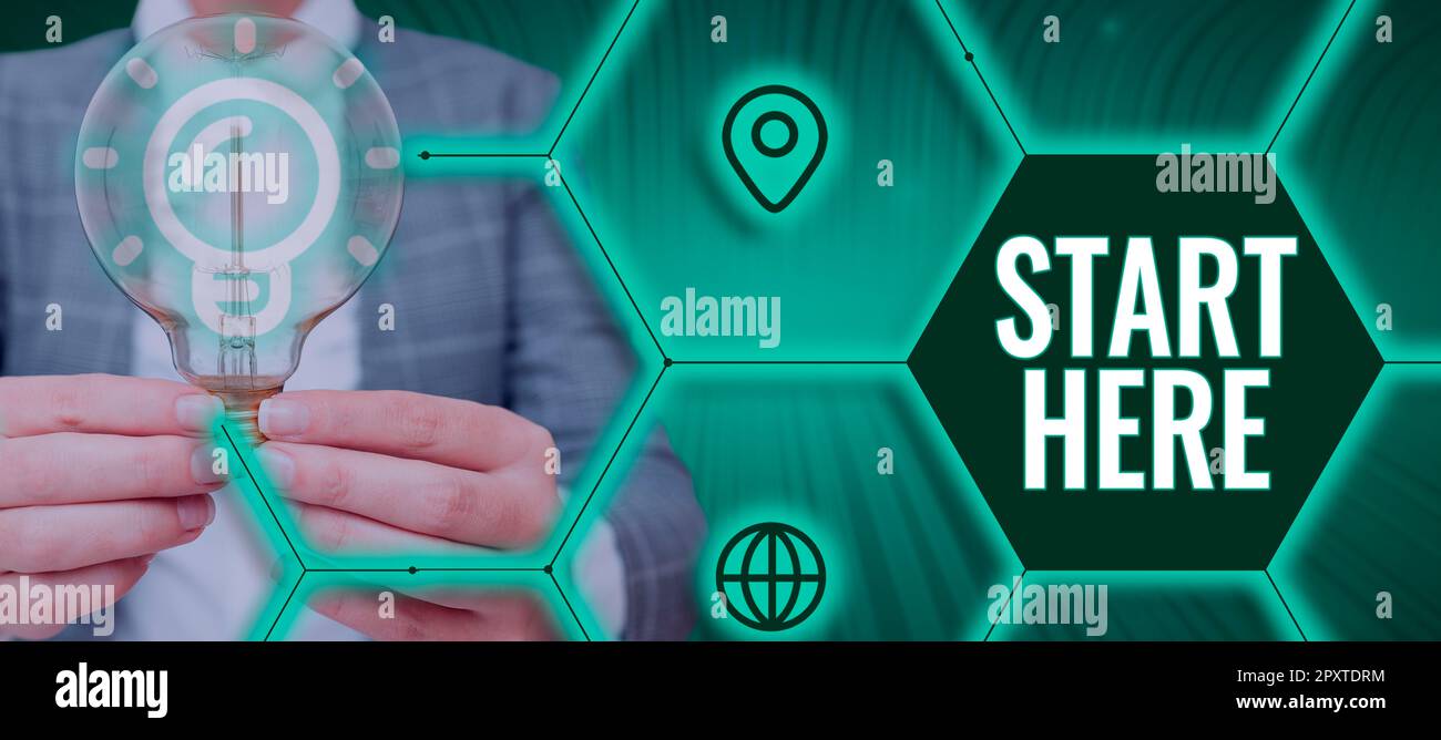 Sign displaying Start Here, Business concept telling someone this is ...