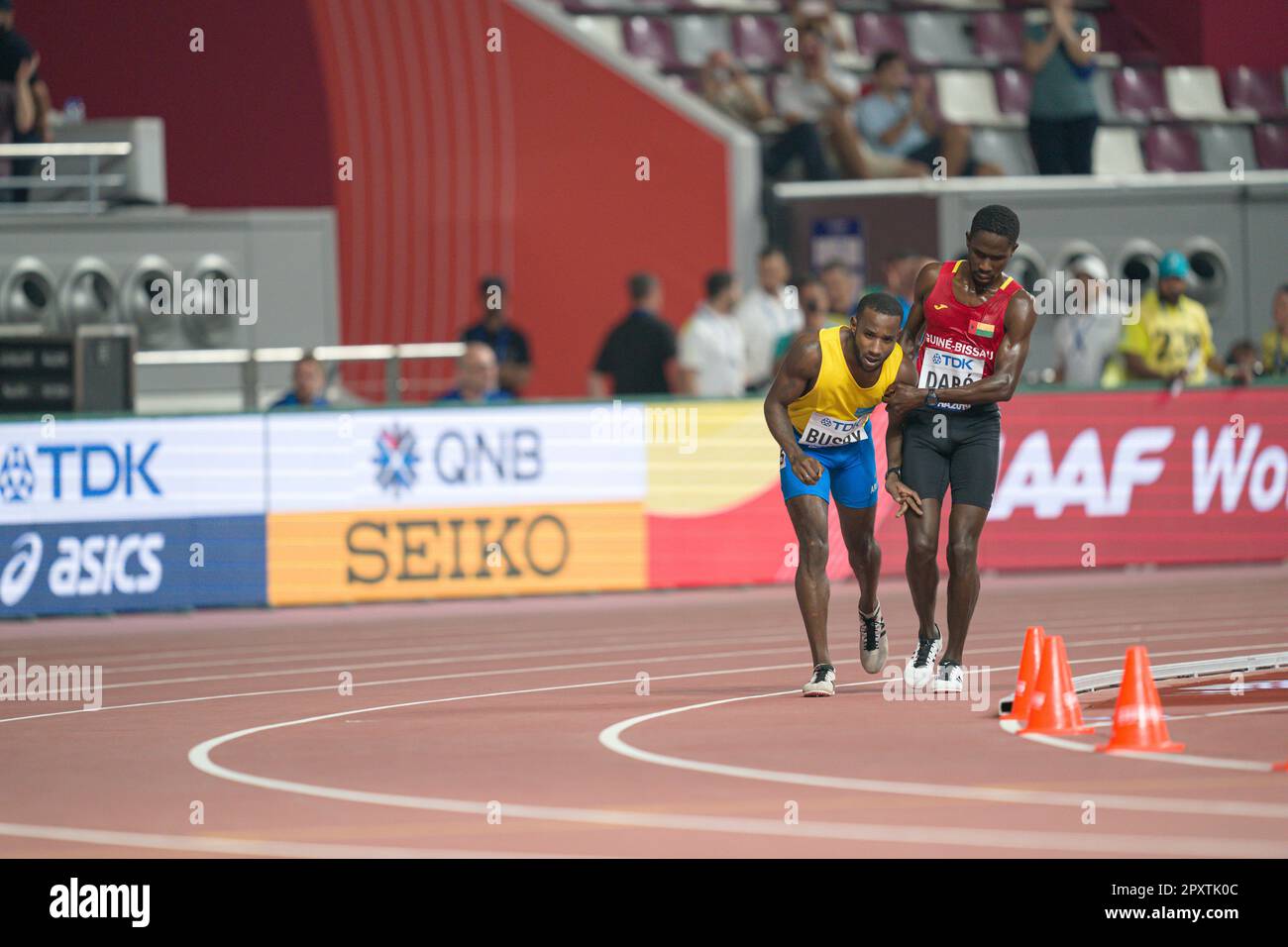 Braima SUNCAR DABO r. (Guinea-Bissau) helps Jonathan BUSBY (Aruba ...
