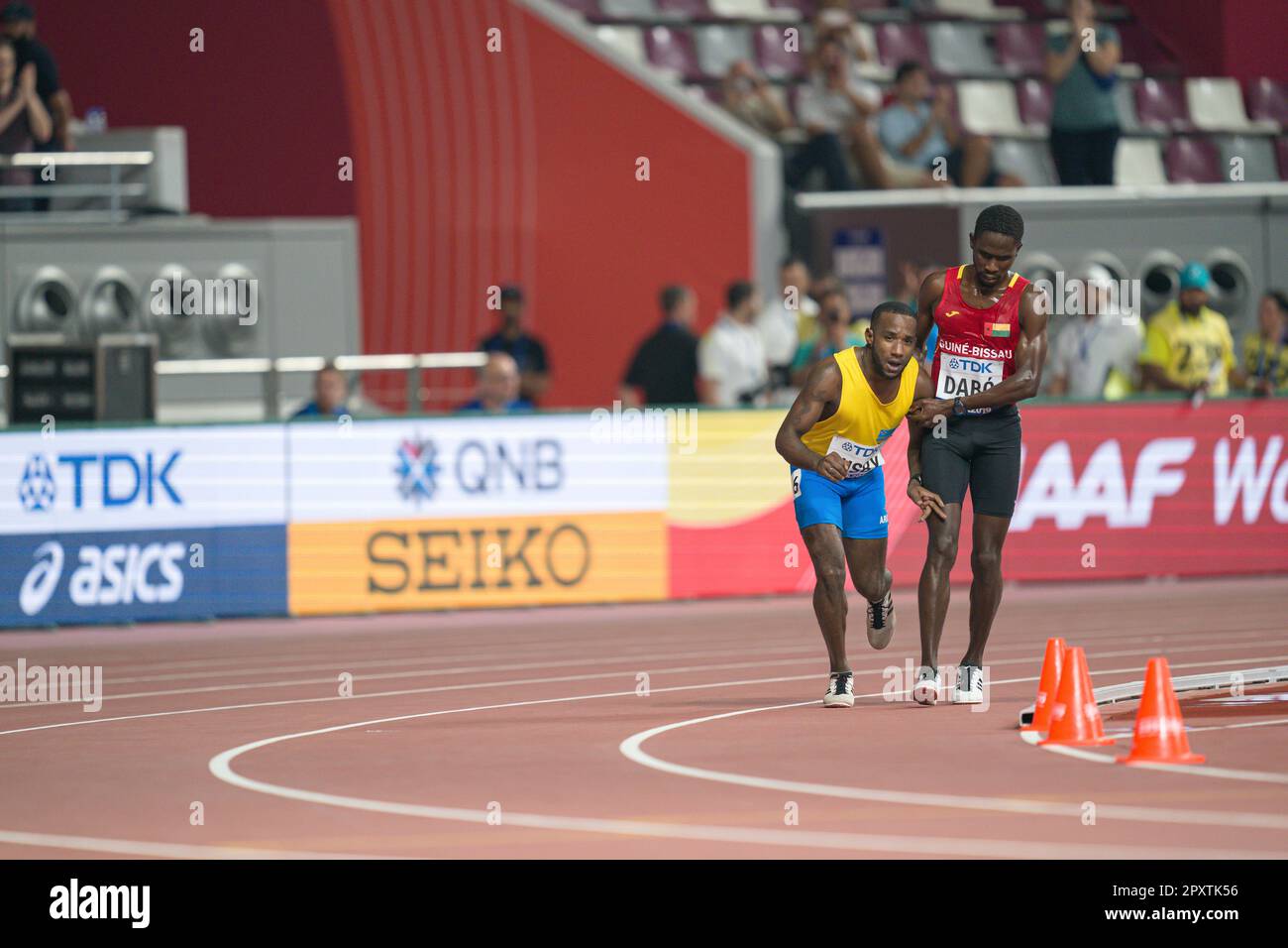Braima SUNCAR DABO r. (Guinea-Bissau) helps Jonathan BUSBY (Aruba ...