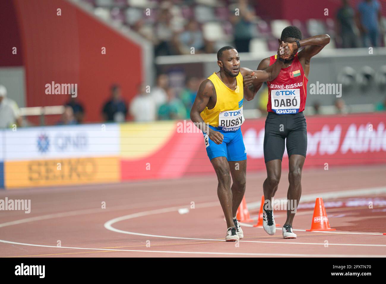 Braima SUNCAR DABO r. (Guinea-Bissau) helps Jonathan BUSBY (Aruba ...