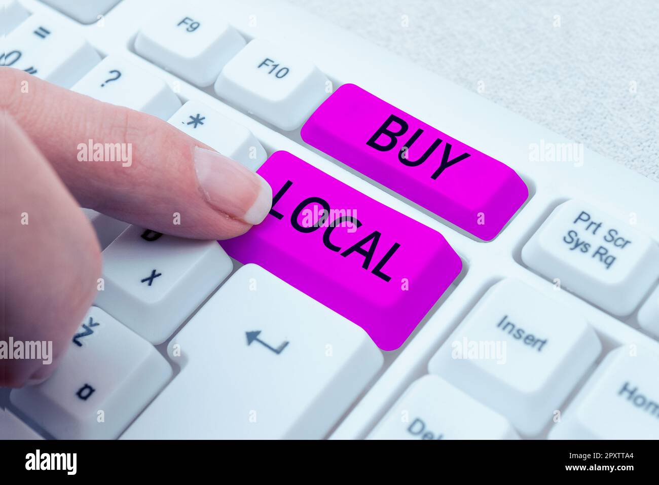 Sign displaying Buy Local, Word for Patronizing products that is ...