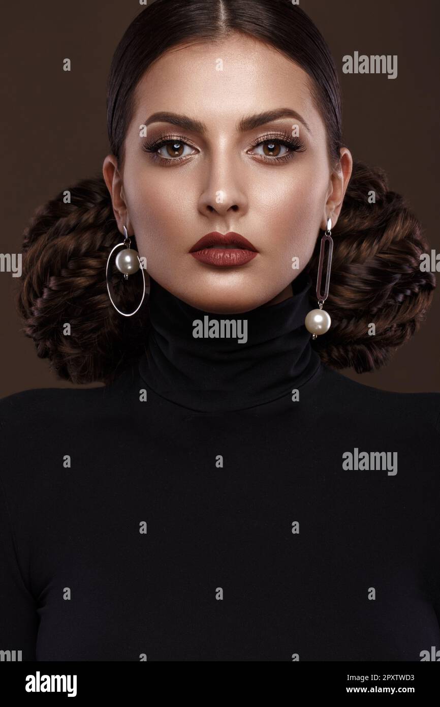 Pretty girl with unusual hairstyle, bright makeup, red lips. Beauty ...