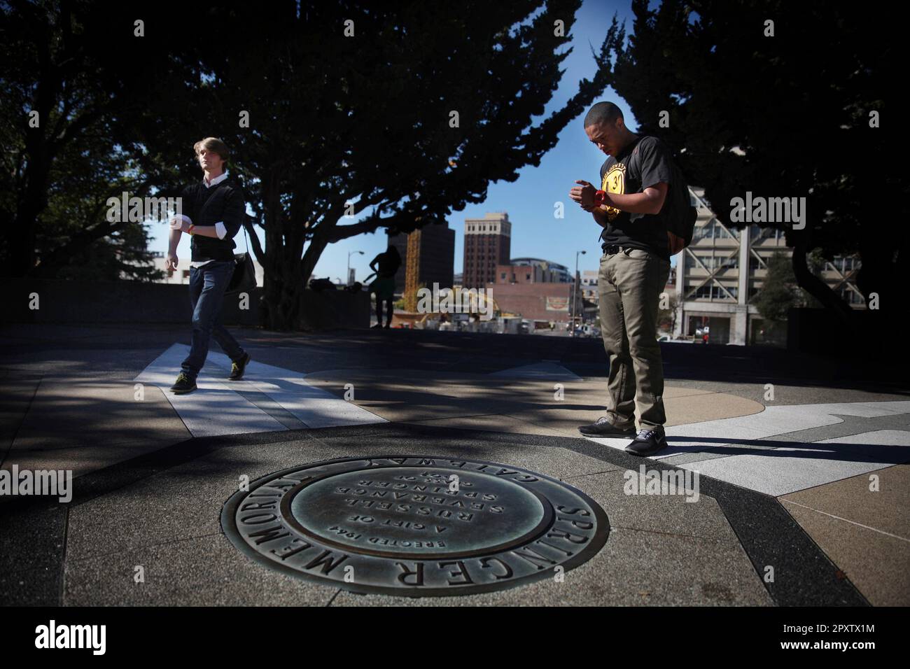 UC Berkeley freshman Joey Ward (l to r), 18 walks across campus as UC ...