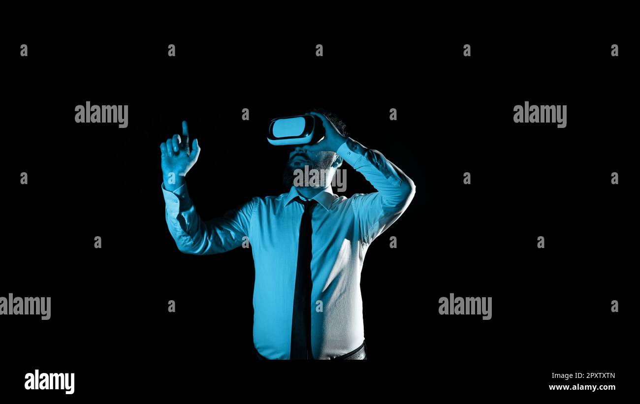 Man Wearing Vr Glasses And Pointing On Important Messages With One ...
