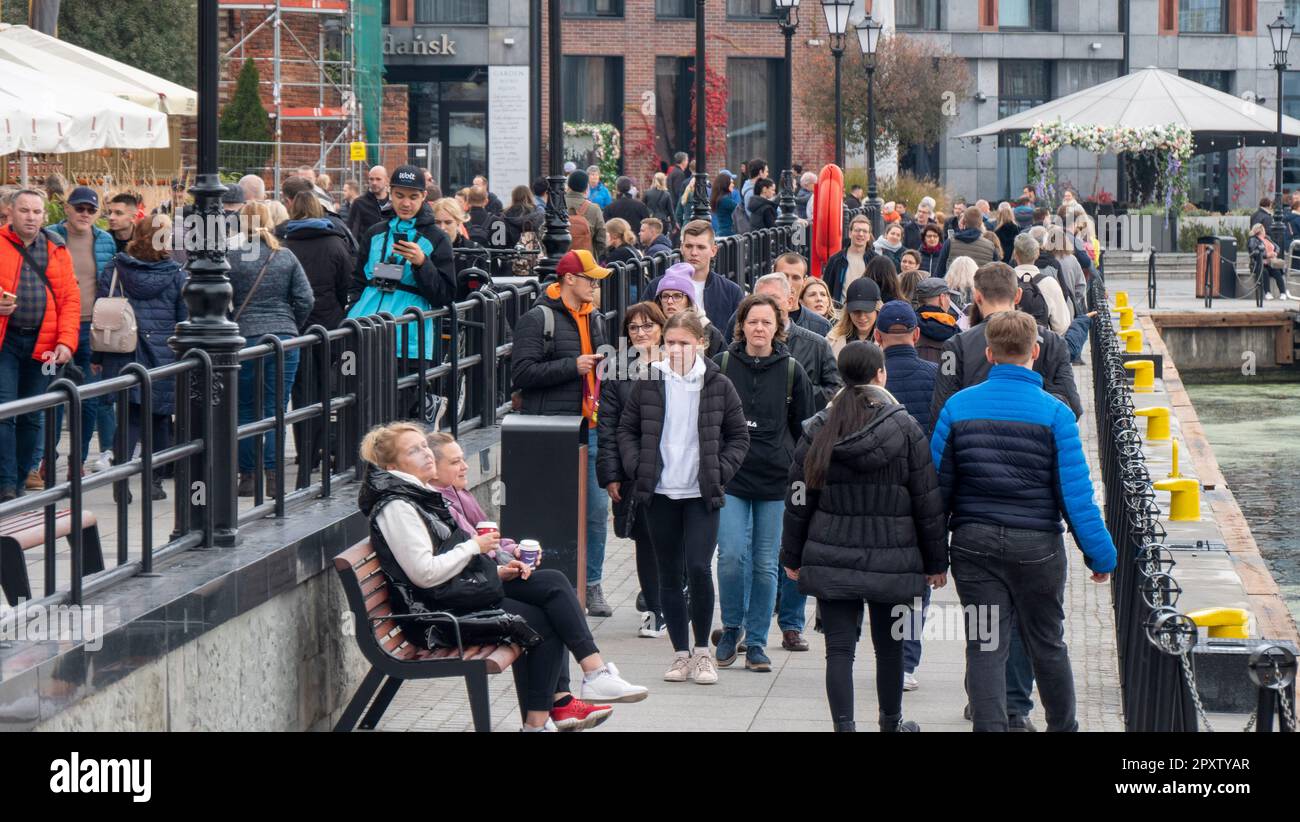 Crowds of people walk by the river in Gdansk Stock Photo - Alamy