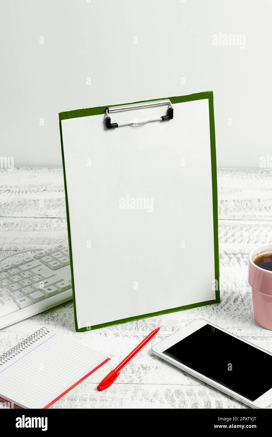 Notebook With Important Messages On Desk With Coffee, Phone And Pen ...