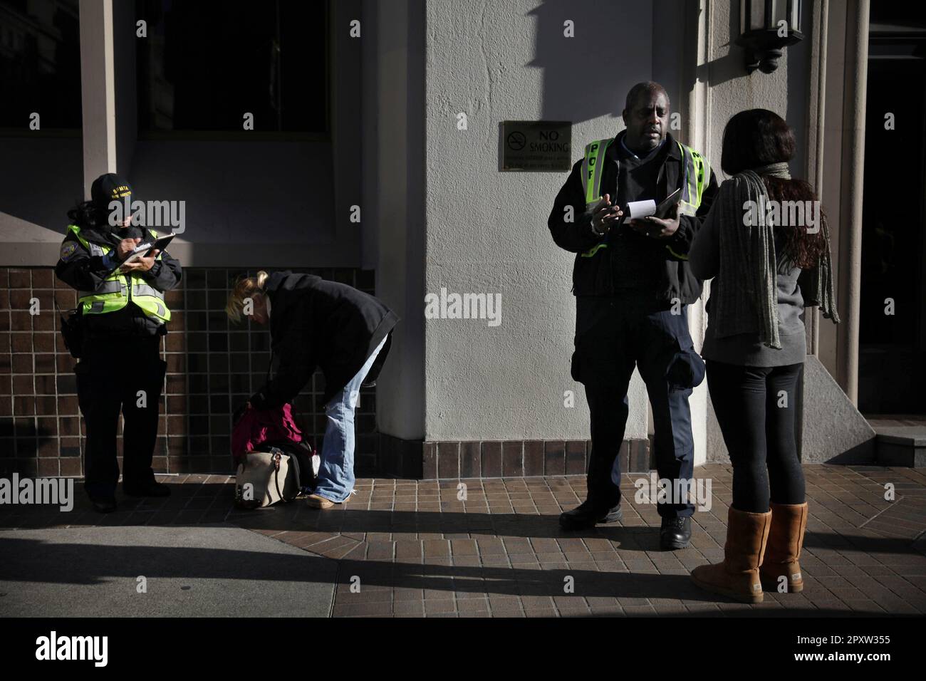 SFMTA transit fare inspectors, Denise Smith (l to r) and Jerome Walls ...