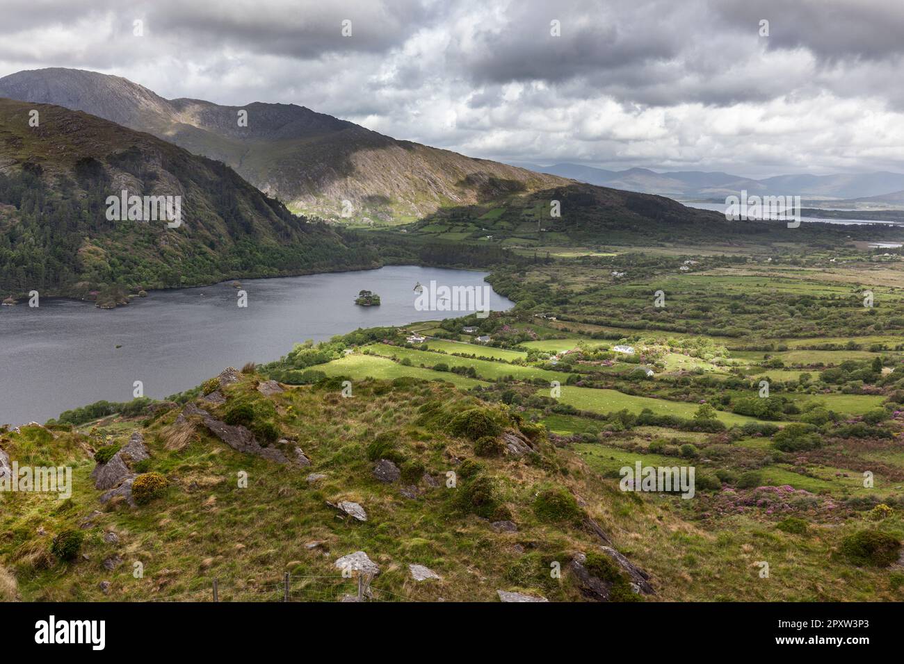 View from Healy Pass across Caha Mountains and the Beara peninsula R574 ...