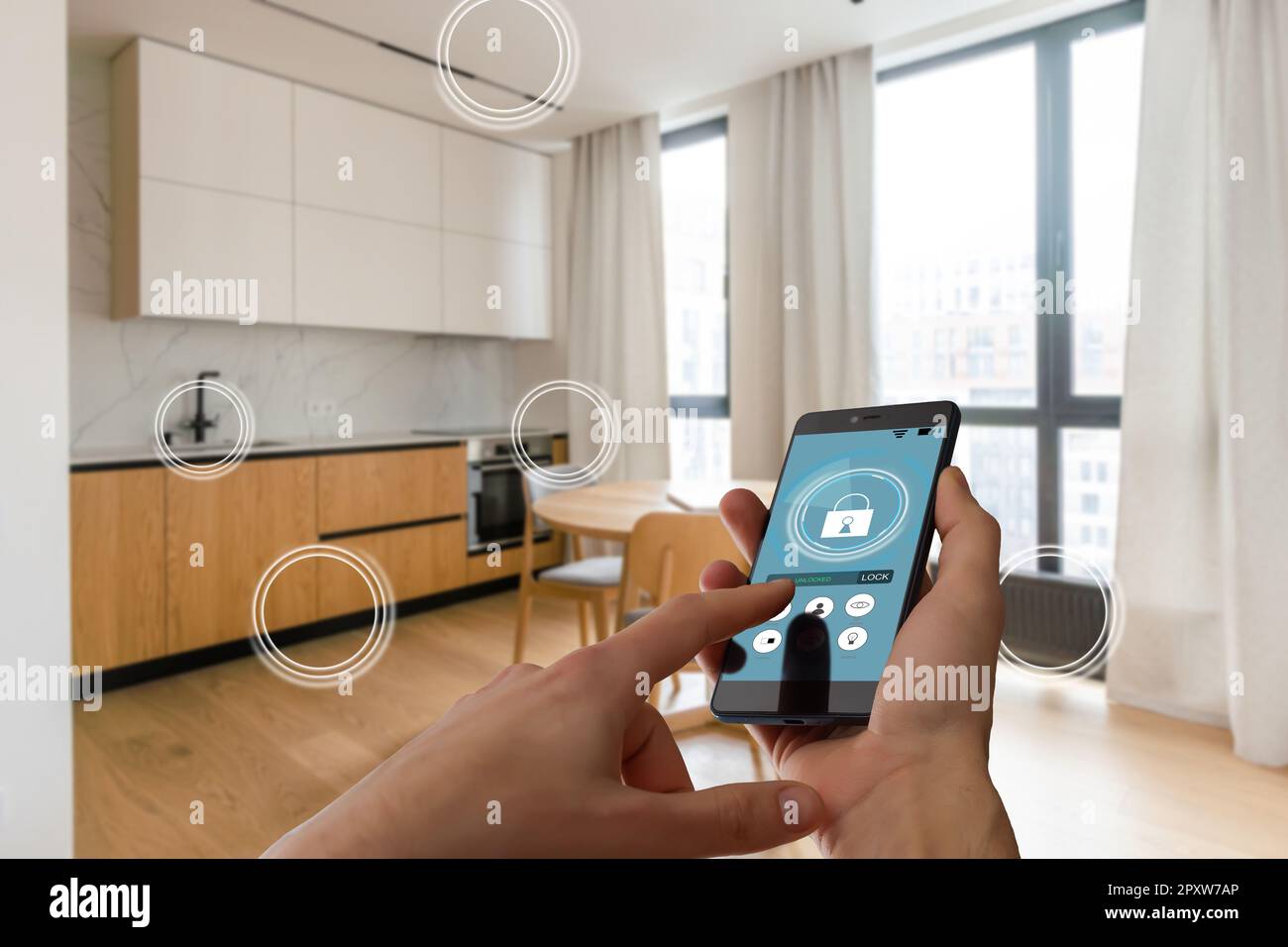 Remote home control system on a phone Stock Photo - Alamy