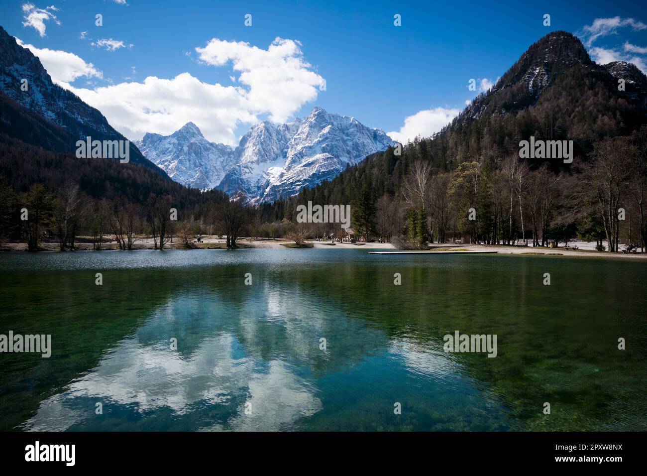 Lake Jasna with Alpine backdrop in Slovenia Stock Photo - Alamy