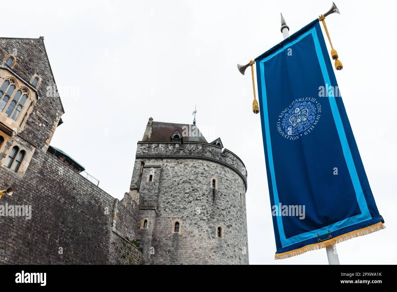 Windsor, UK. 2nd May, 2023. A ceremonial banner is displayed outside ...