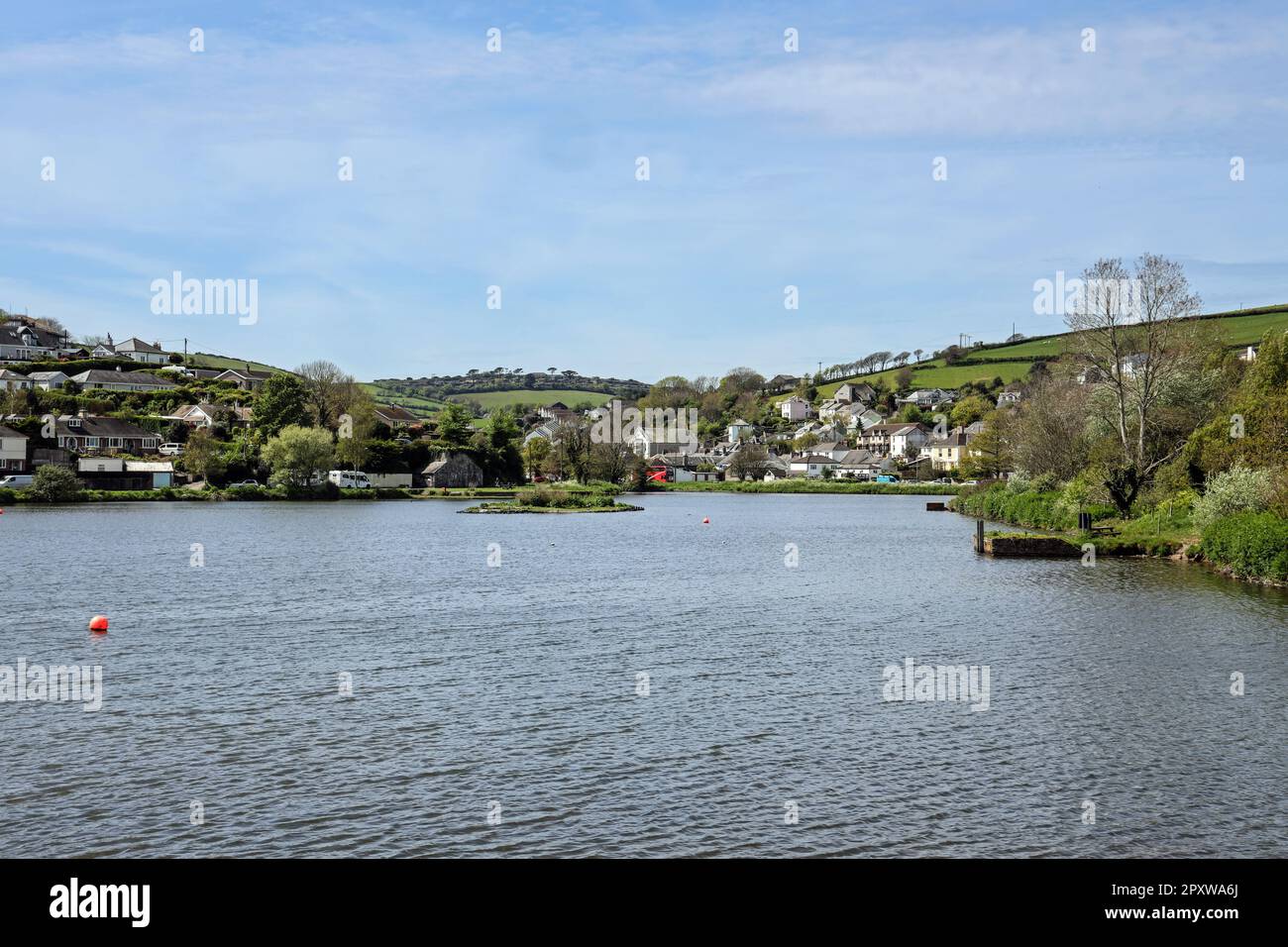 Millbrook seen over the Millbrook Lake in south east Cornwall Stock ...